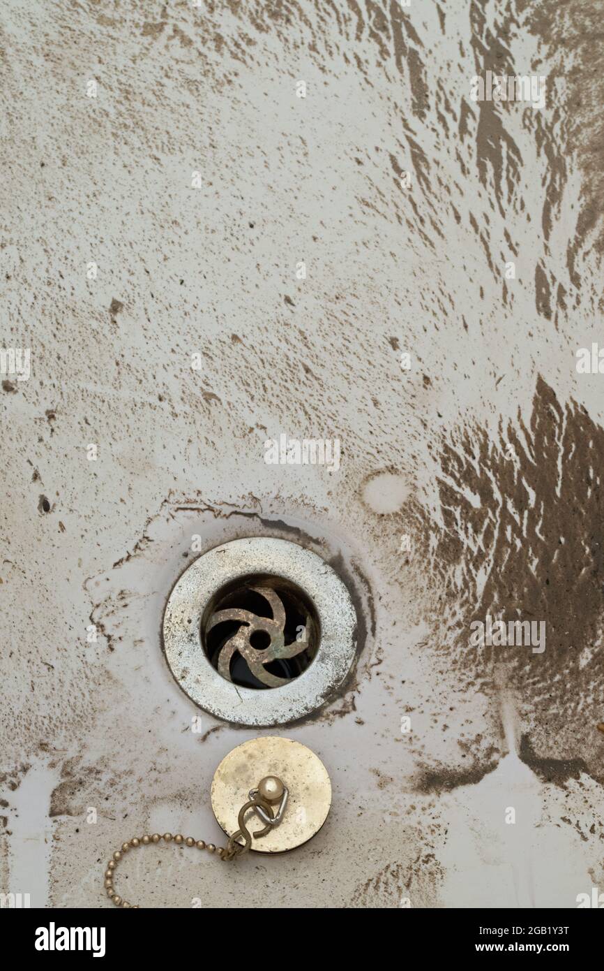 Bath, base, bottom with pattern of dirt, detritus, sand, grit leaving ...