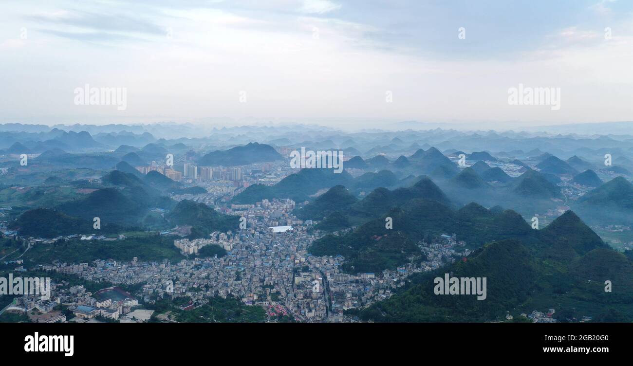 ANLONG, CHINA - AUGUST 2, 2021 - Aerial photo shows multiple peaks in ...