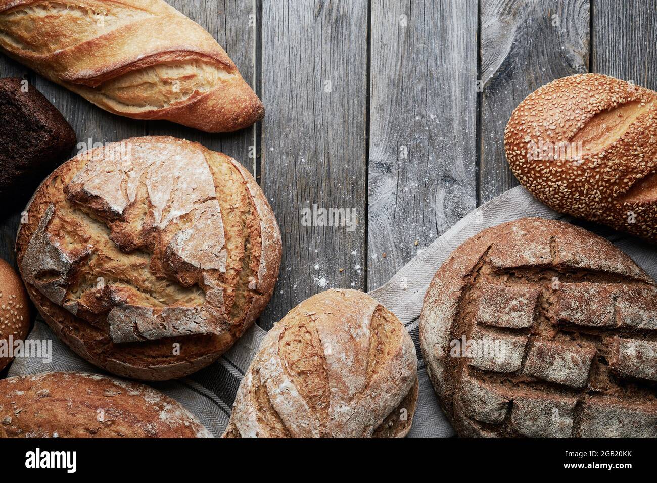 Assorted homemade gluten-free and yeast-free bread on grey wooden ...