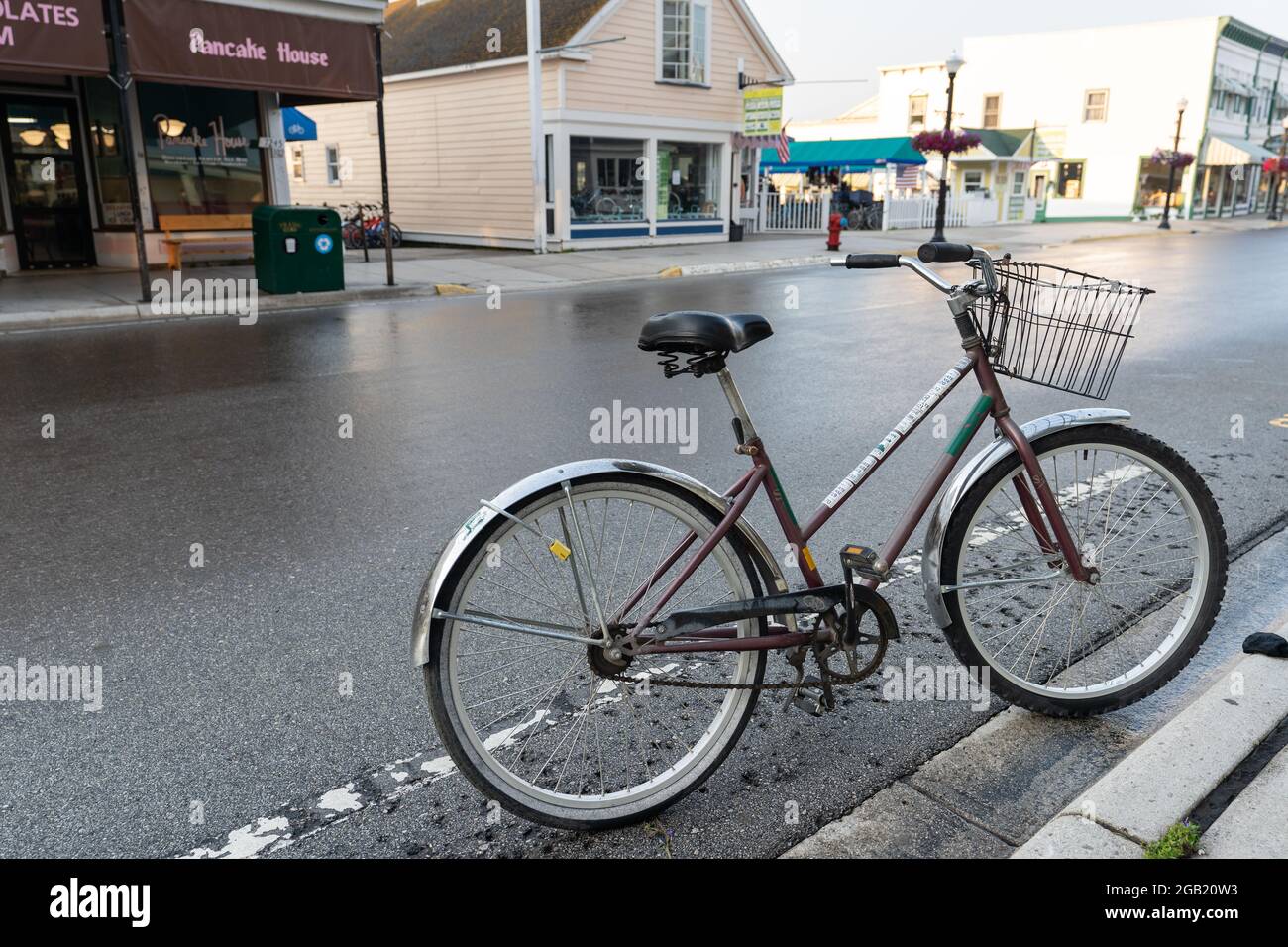 One bicycle on the main street at Mackinac island Michigan in the early ...