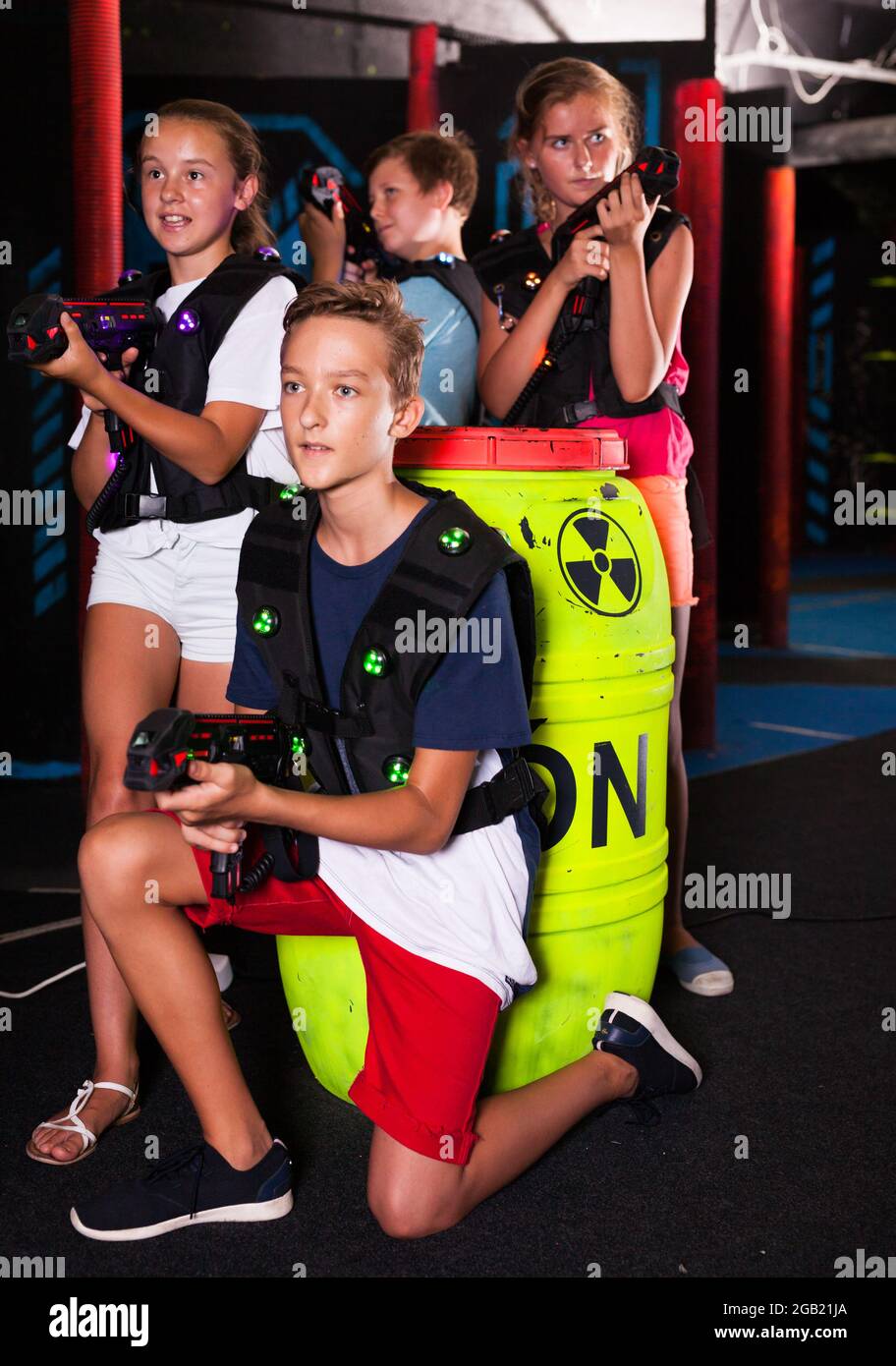 Teen kids with laser guns Stock Photo - Alamy