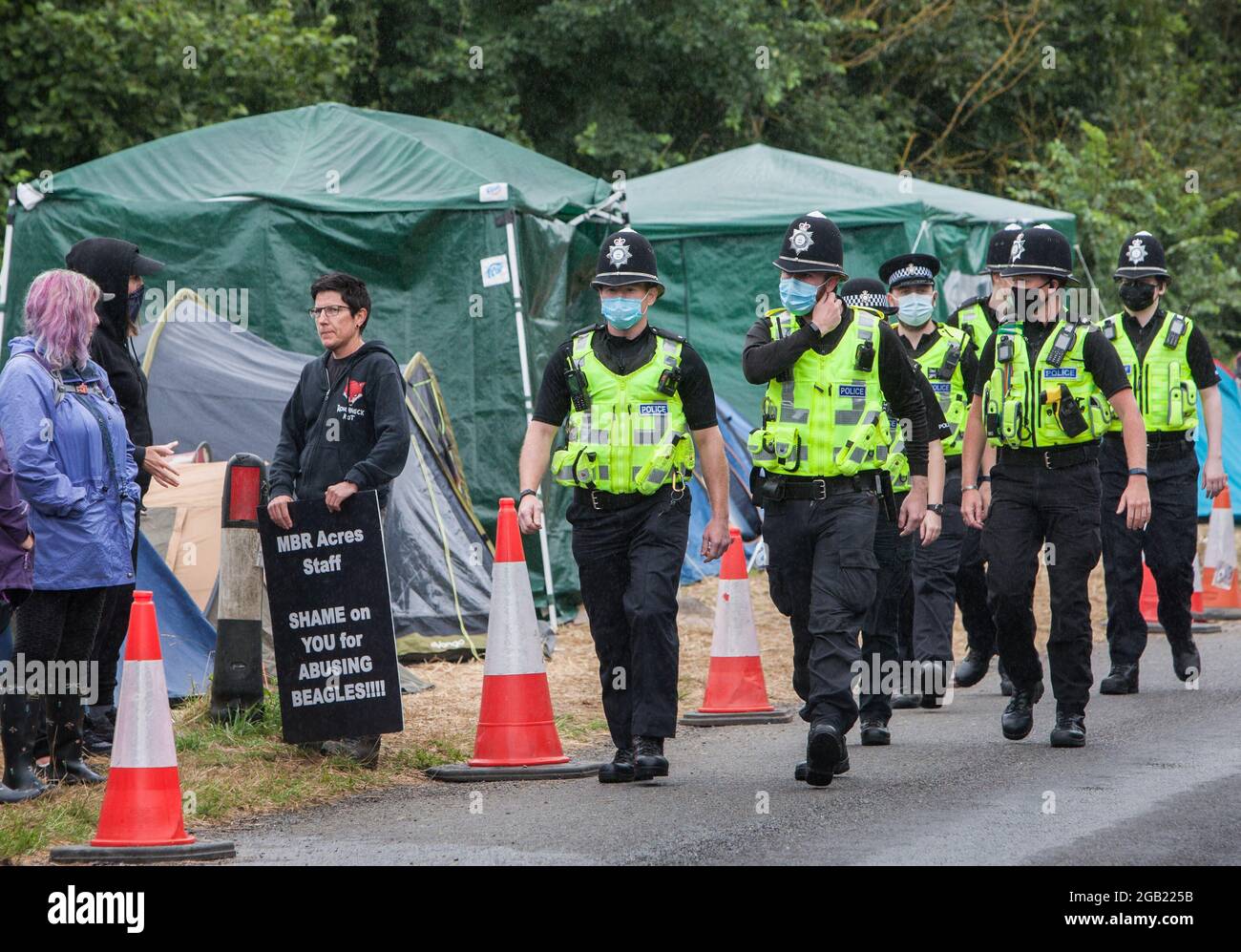 Police officers join colleagues during the demonstration. Protesters ...