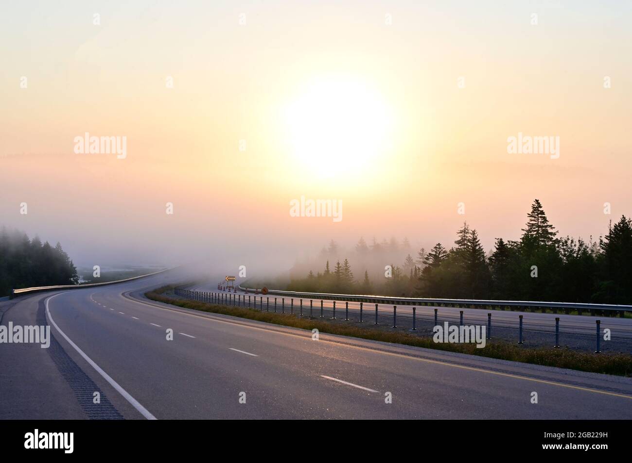 Highway in the early morning at sunrise Stock Photo - Alamy