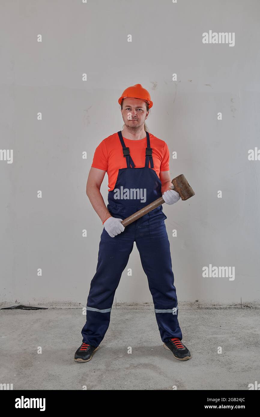 Construction engineer worker sledgehammer hi-res stock photography and ...