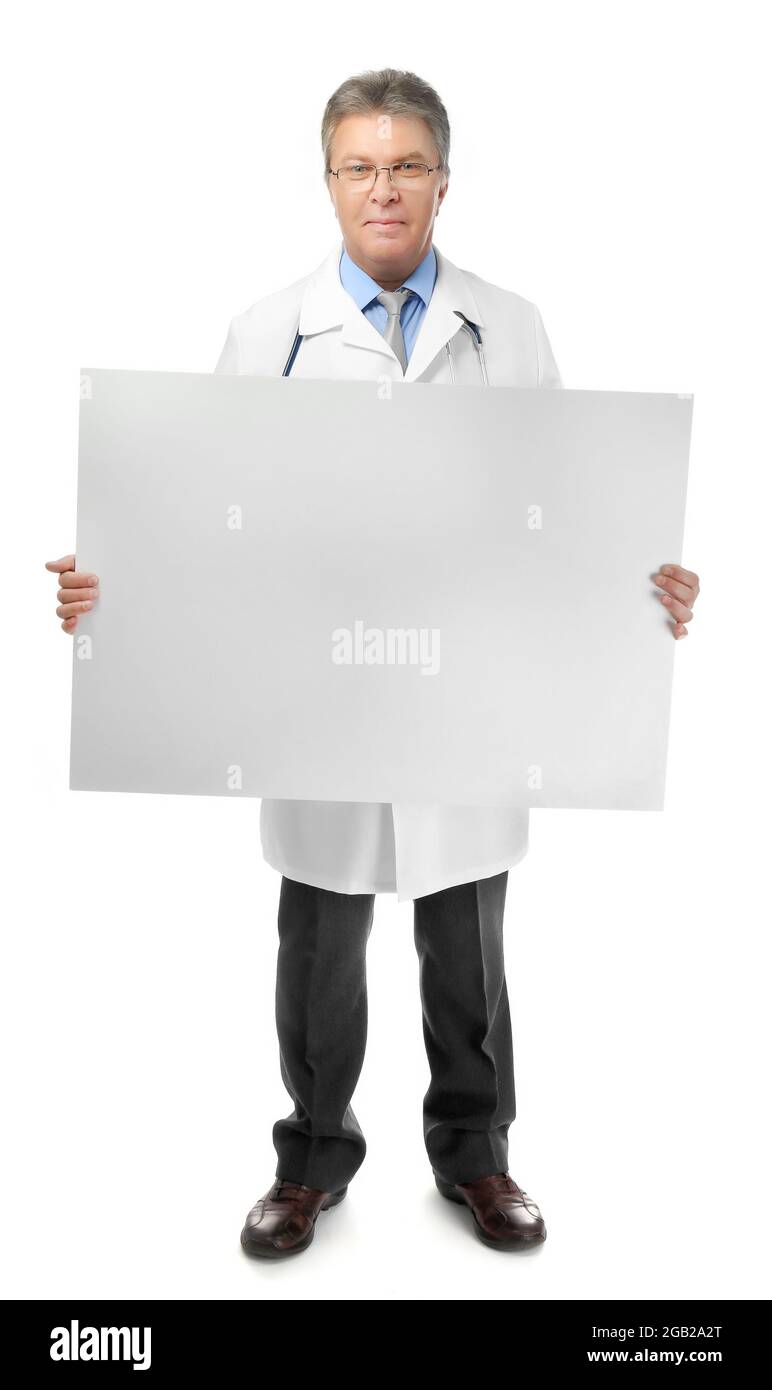A handsome doctor with screen, isolated on white Stock Photo - Alamy