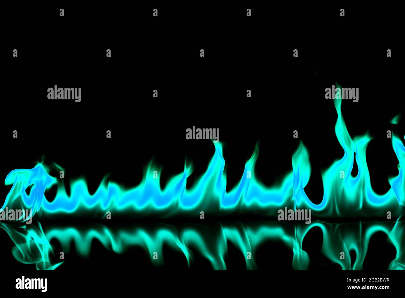 Blue fire flames on black background Stock Photo - Alamy