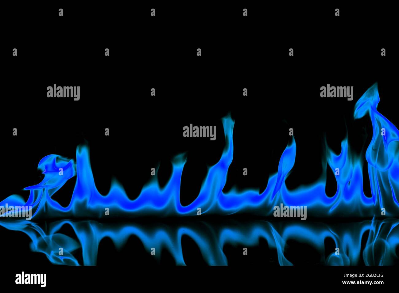 Blue fire flames on black background Stock Photo - Alamy