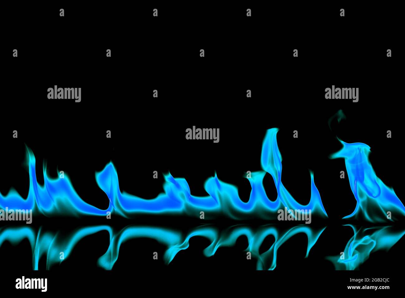 Blue fire flames on black background Stock Photo - Alamy