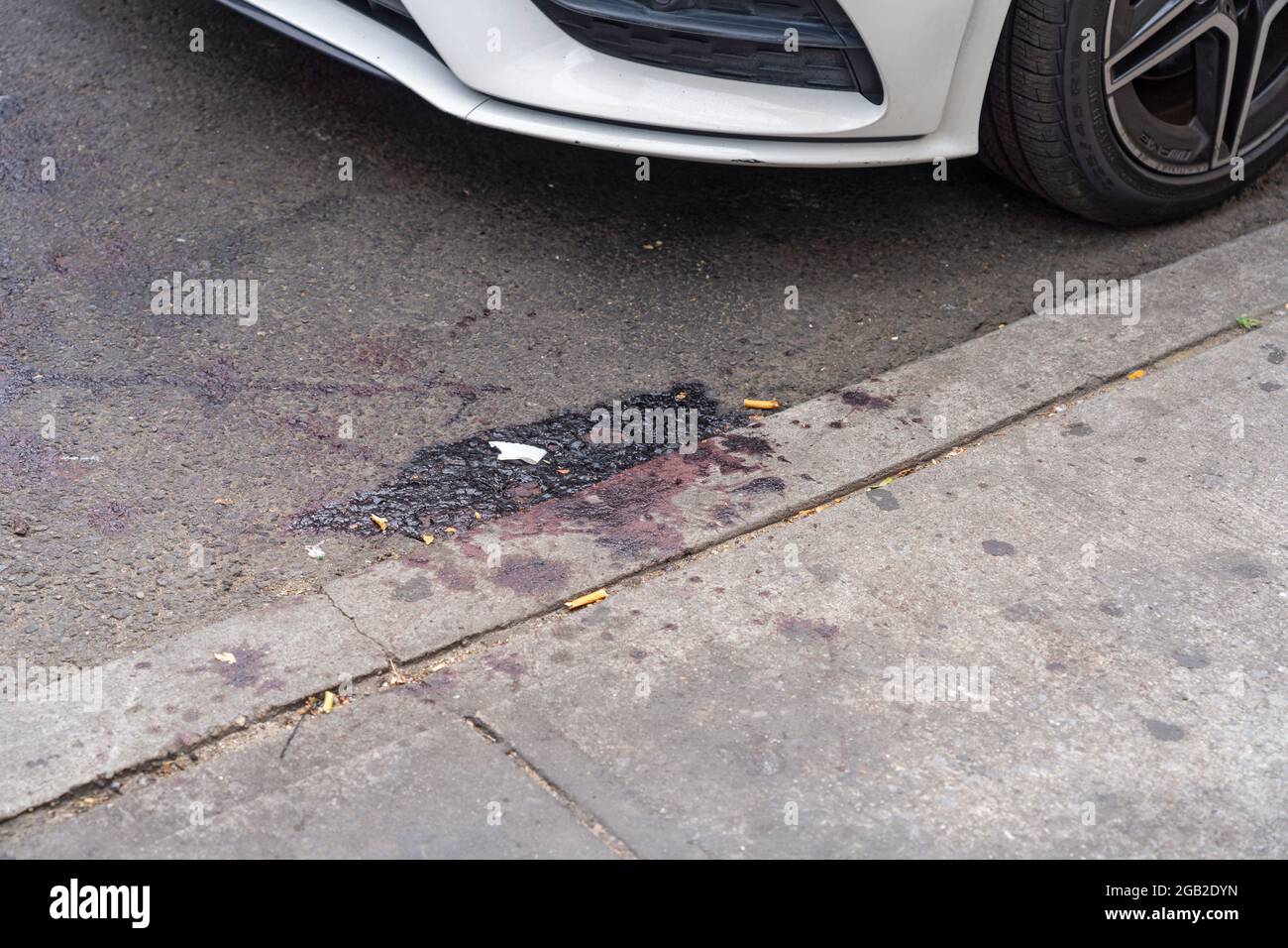 Blood seen on sidewalk hi-res stock photography and images - Alamy