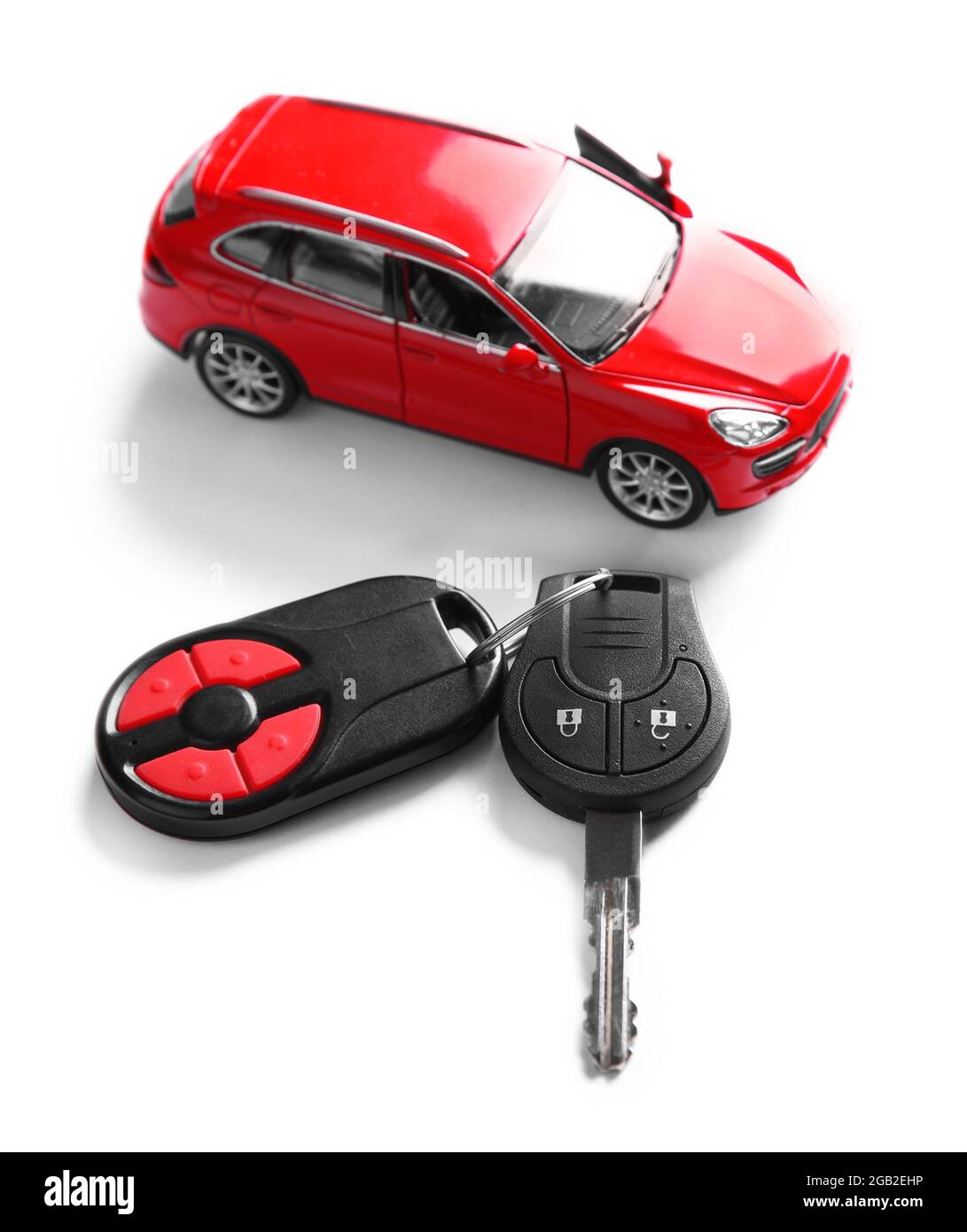 New red car with keys, isolated on white Stock Photo - Alamy