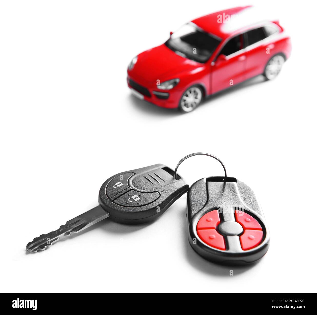 New red car with keys, isolated on white Stock Photo - Alamy