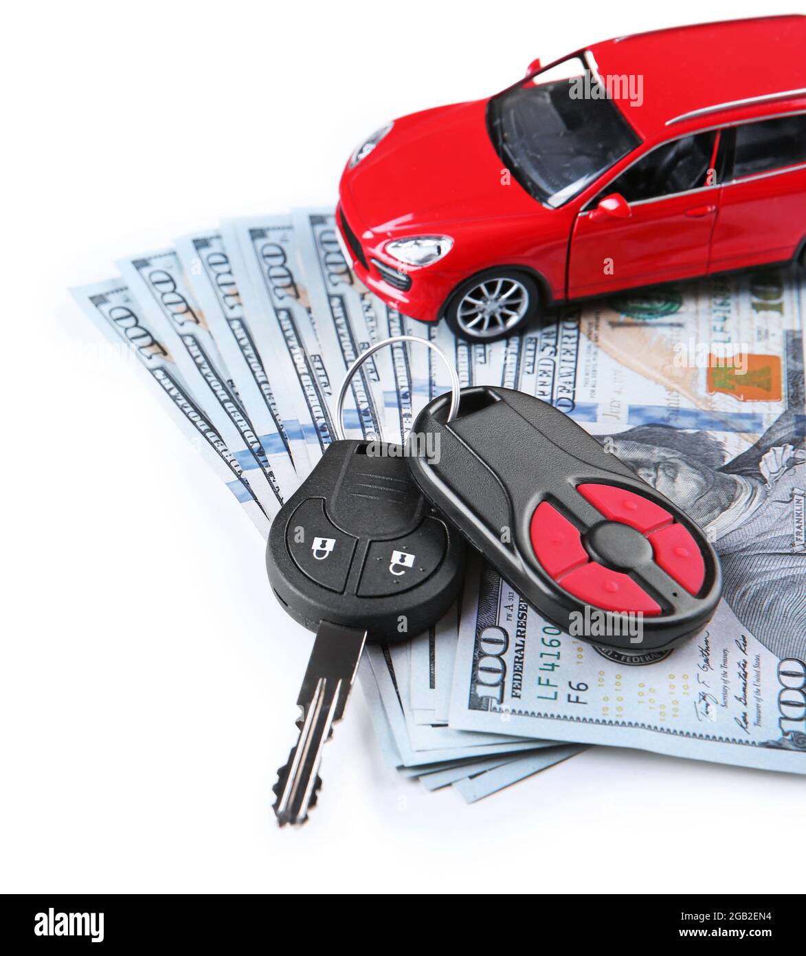 New red car with keys and dollar banknotes on white background Stock ...