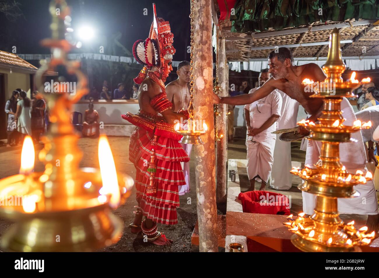 Theyyam artist perform during temple festival in Payyanur, Kerala ...