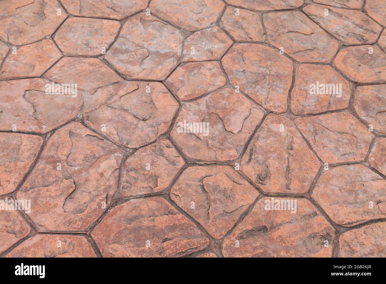 Orange concrete pavement stone texture on the floor Stock Photo - Alamy