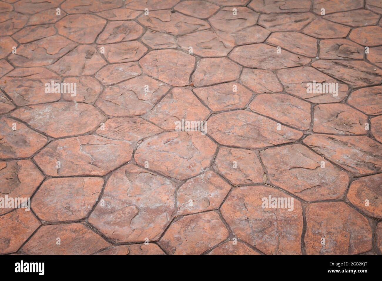 Orange concrete pavement stone texture on the floor Stock Photo - Alamy
