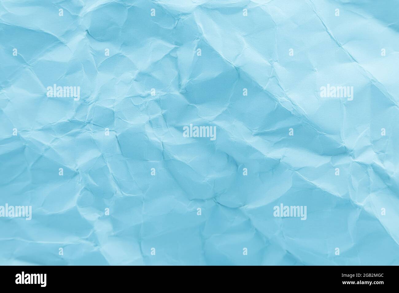 Blue crumpled paper surface background Stock Photo - Alamy