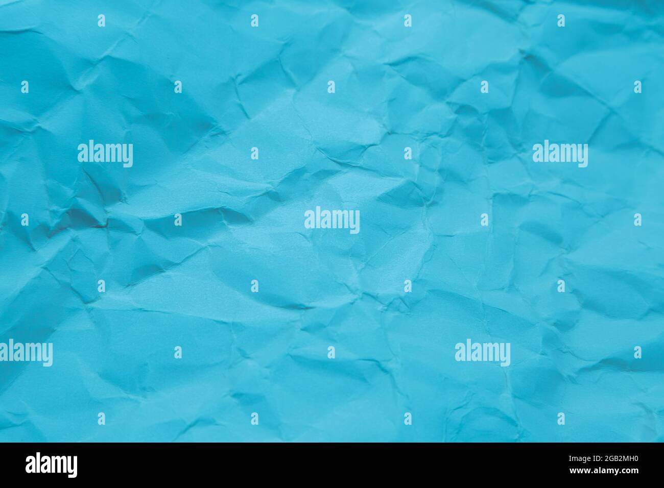 Blue crumpled paper surface background Stock Photo - Alamy