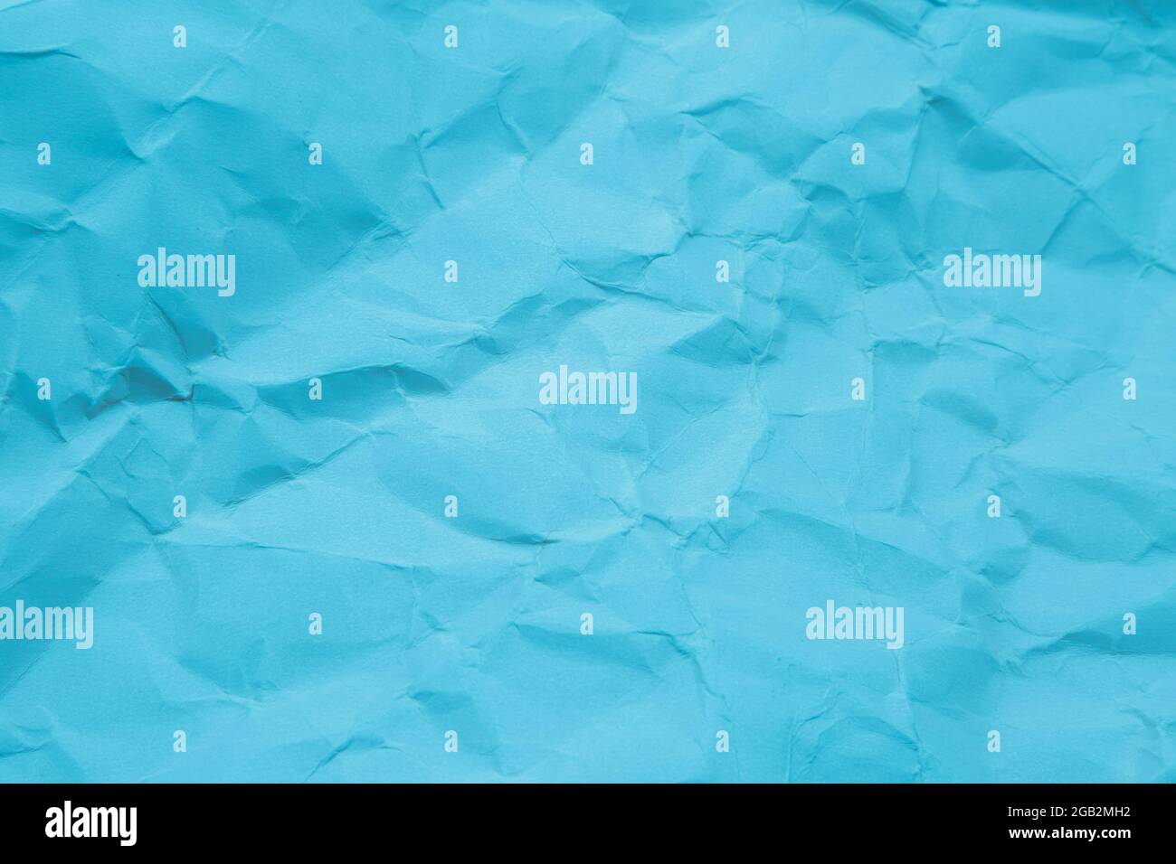 Blue crumpled paper surface background Stock Photo - Alamy