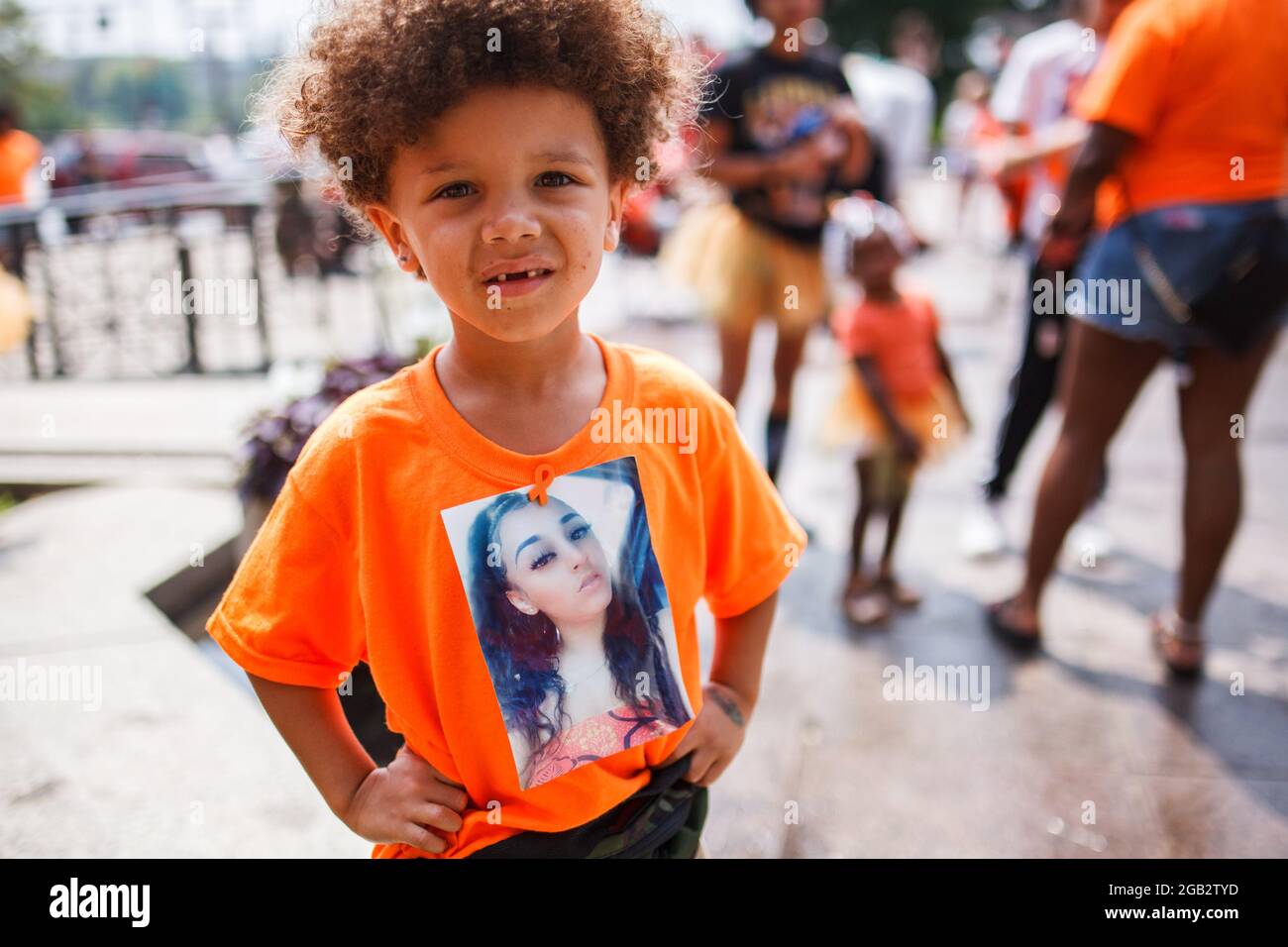 Prynce Brunner, 4, stands with a picture of his mother, Mia Leíann ...