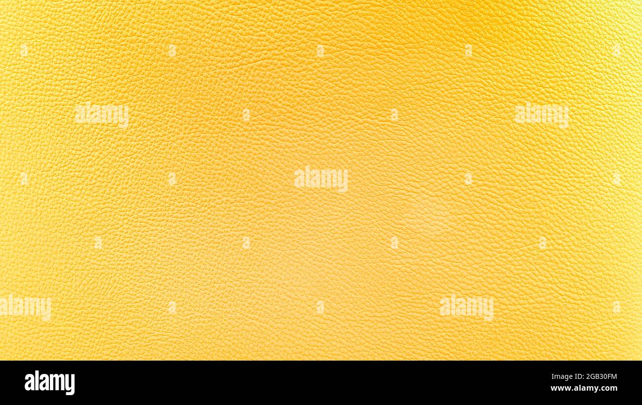 Yellow leather closeup texture background Stock Photo - Alamy