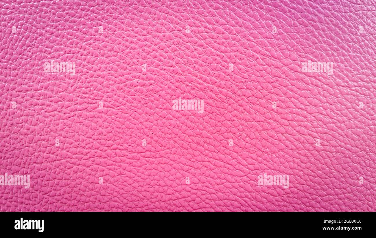 Pink leather closeup texture background Stock Photo - Alamy