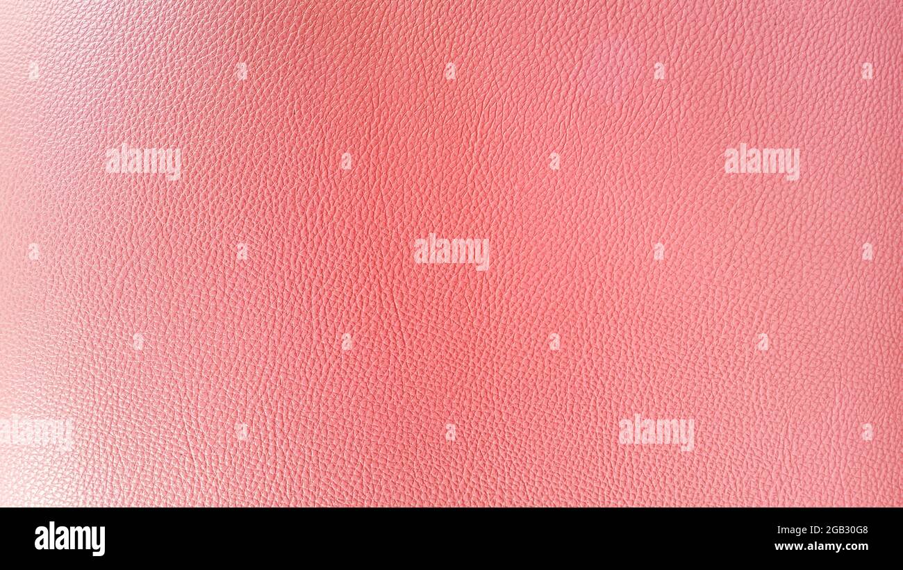 Pink leather closeup texture background Stock Photo - Alamy