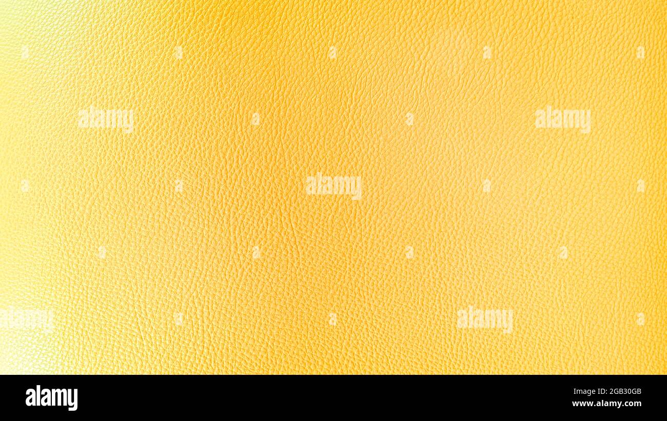 Yellow leather closeup texture background Stock Photo - Alamy