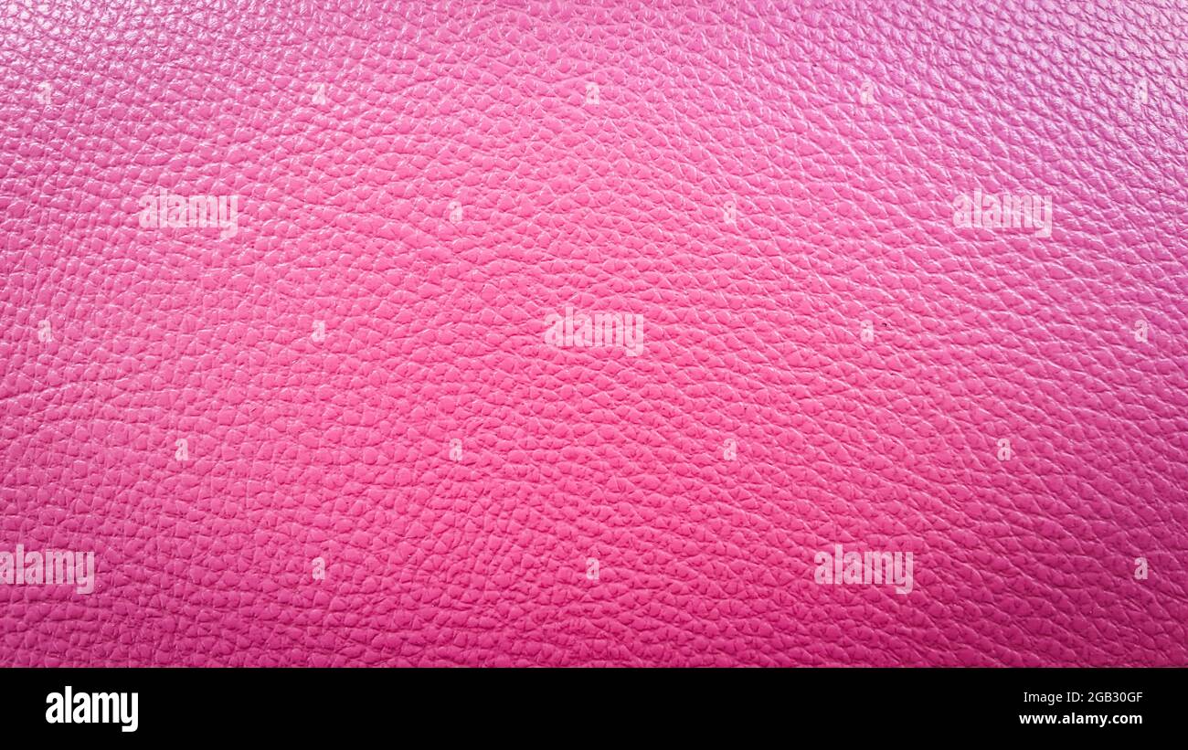 Pink leather closeup texture background Stock Photo - Alamy