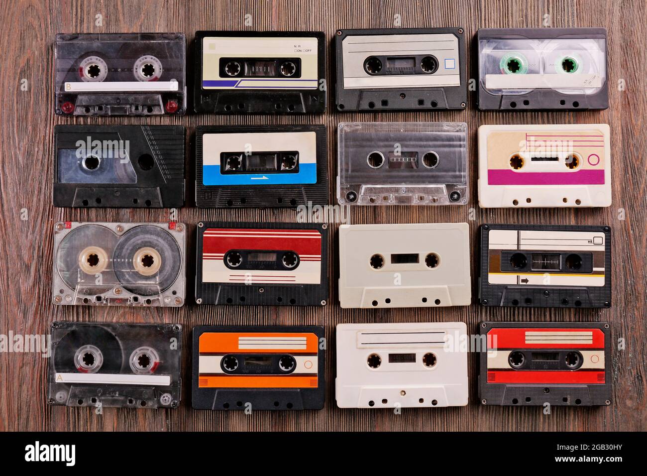 Set of old audio cassettes on wooden background Stock Photo - Alamy