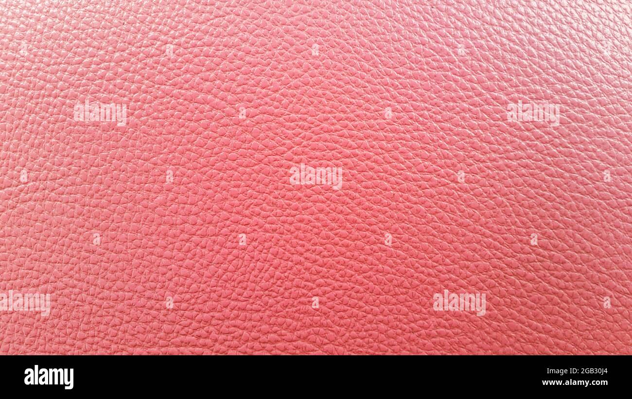 Pink leather closeup texture background Stock Photo - Alamy
