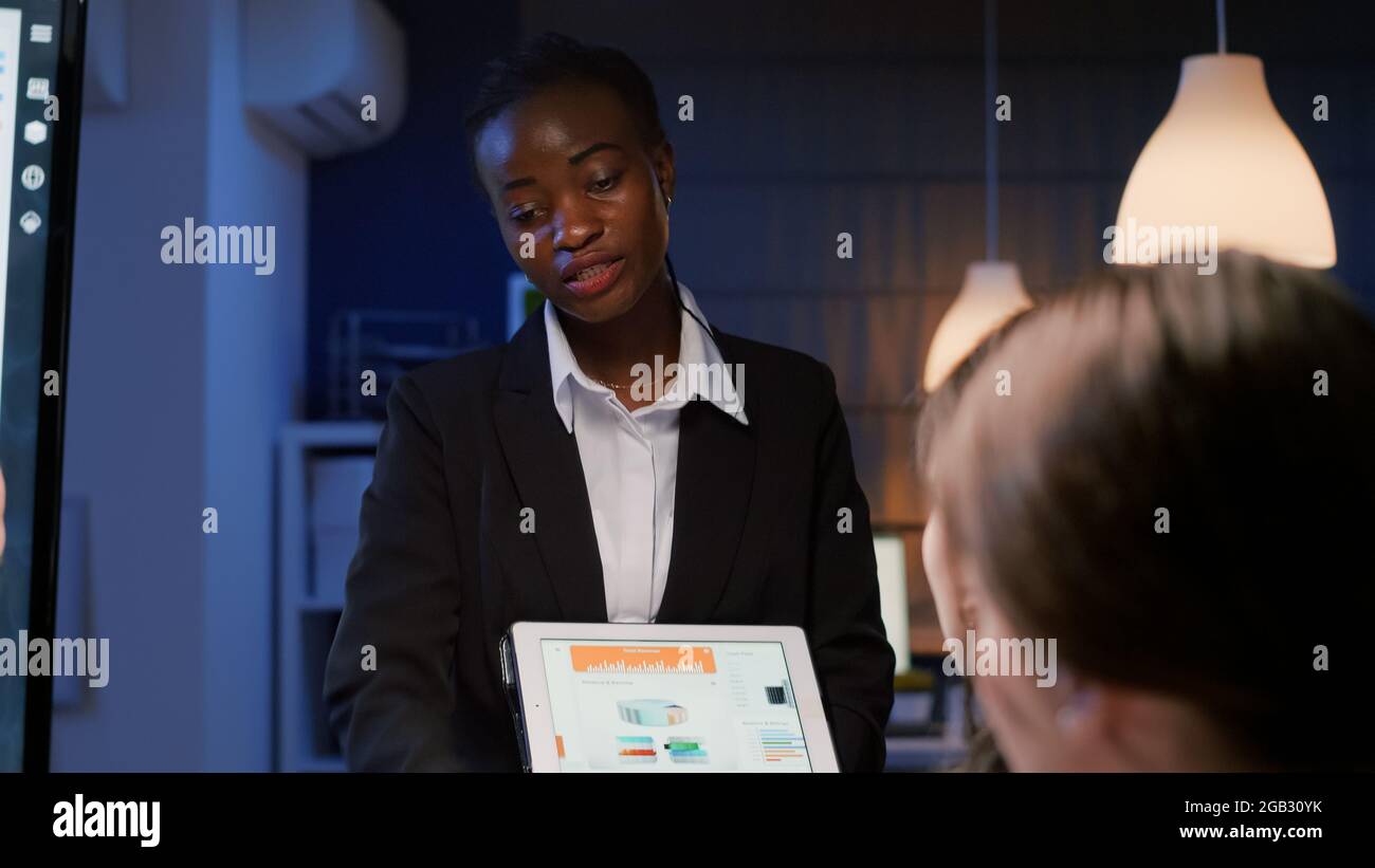 Executive manager black woman working in office meeting room explaining ...