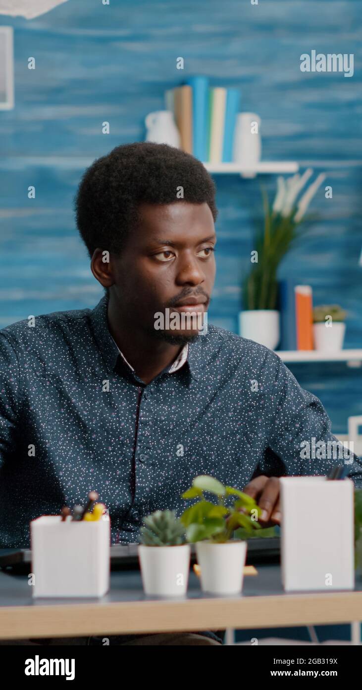 Authentic african american man computer user working from home in ...