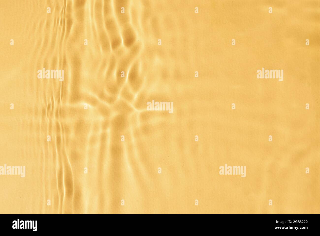 Yellow water surface background. Water texture with reflections ...