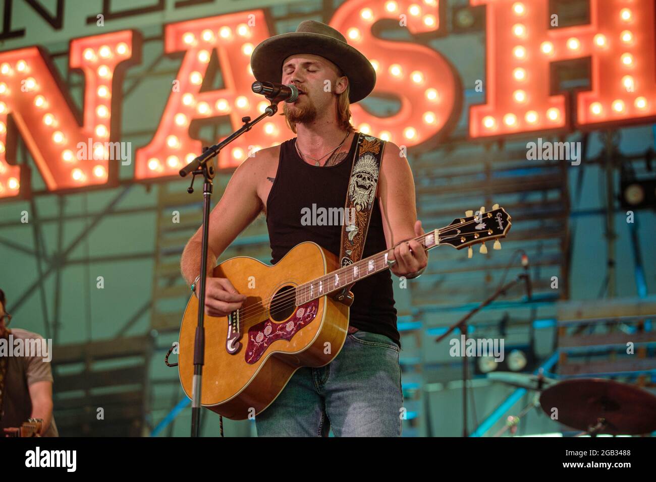 SInger Jackson Dean performs on the Next to Nashville Stage during day ...