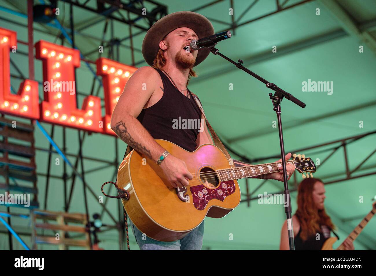 SInger Jackson Dean performs on the Next to Nashville Stage during day ...