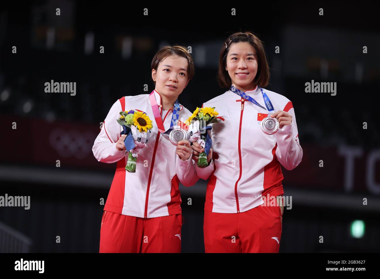 Tokyo, Japan. 2nd Aug, 2021. Silver medalists Chen Qingchen (L)/Jia Yifan of China pose during ...