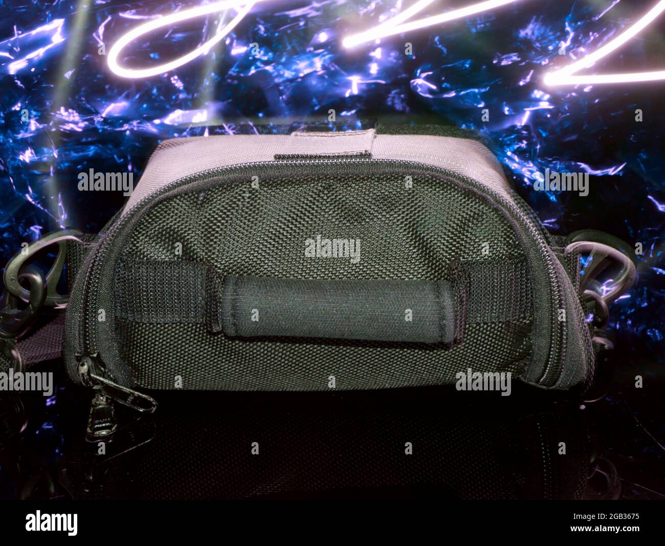 Gift handy bag presented with light effect blueish ray background for ...