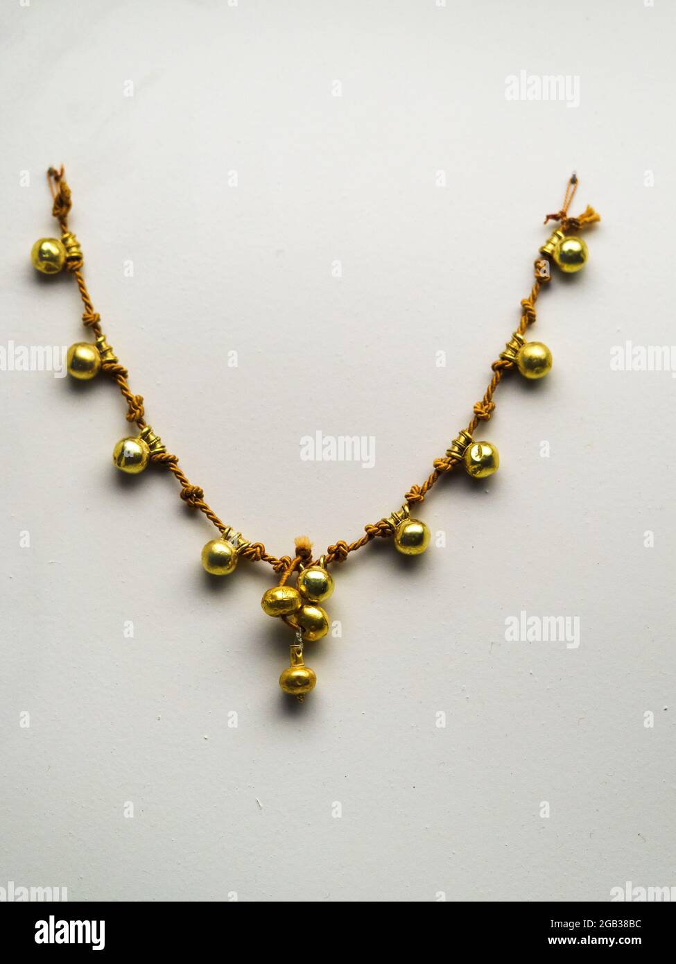 Necklace with gold sphere pendants and central amphora pendant (4th ...
