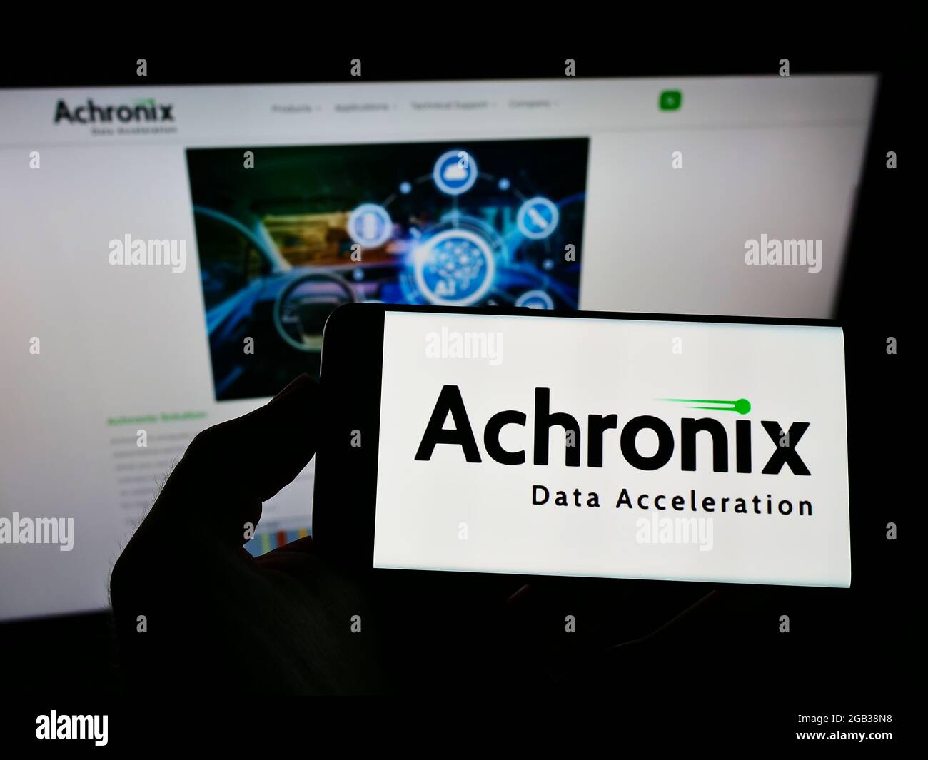 Person holding smartphone with logo of US company Achronix ...