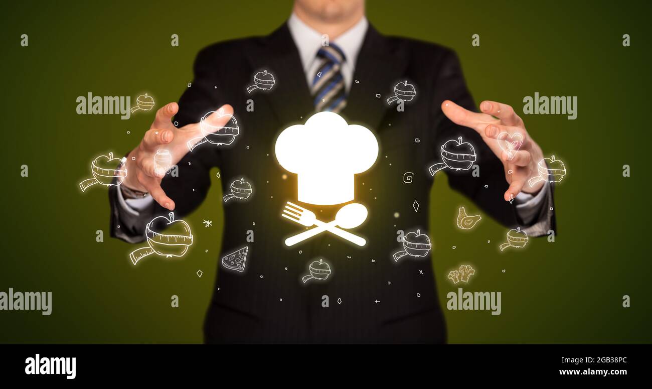 Hand holding food related icons Stock Photo - Alamy