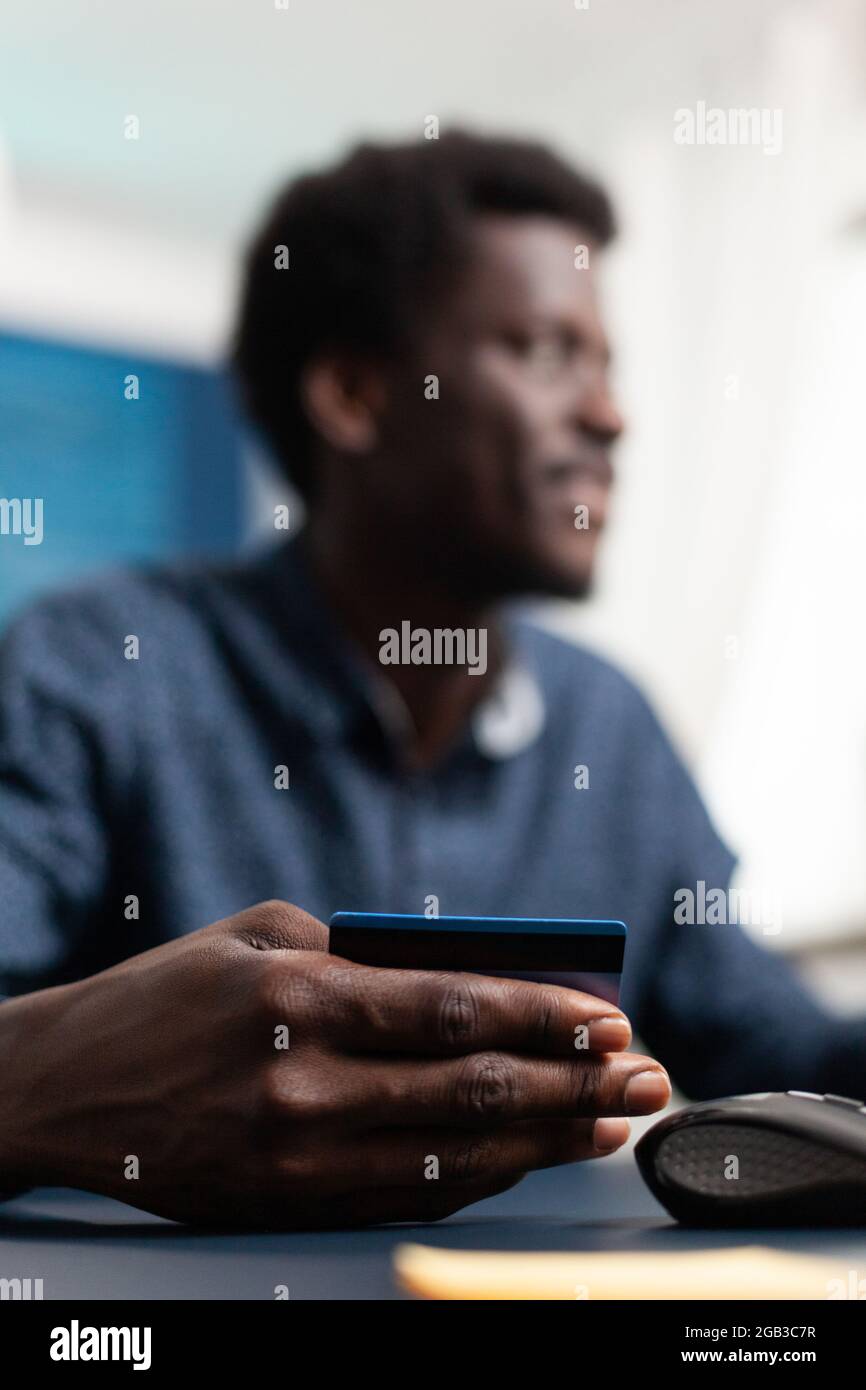Black man purchasing technology hi-res stock photography and images - Alamy