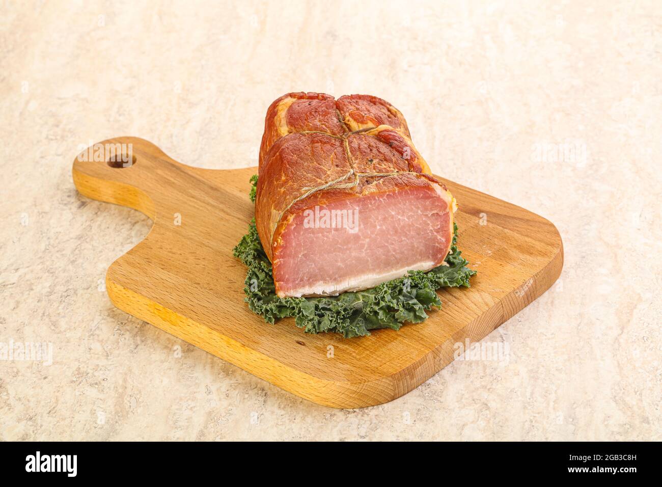 Delicous pork cured meat isolated over board Stock Photo - Alamy