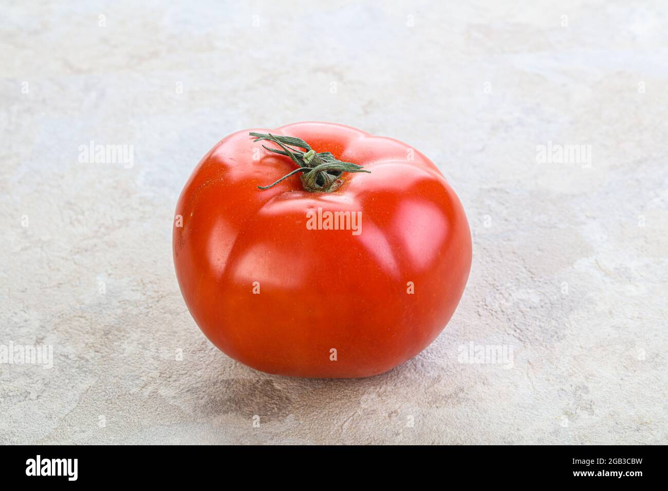Red ripe big juicy tomato isolated Stock Photo - Alamy