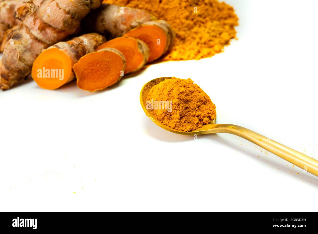 Turmeric rhizome and powder on white background Stock Photo - Alamy