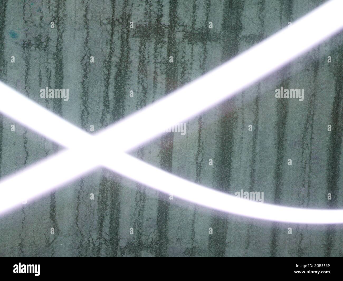 Cross light background with fabric frame on back view Stock Photo - Alamy
