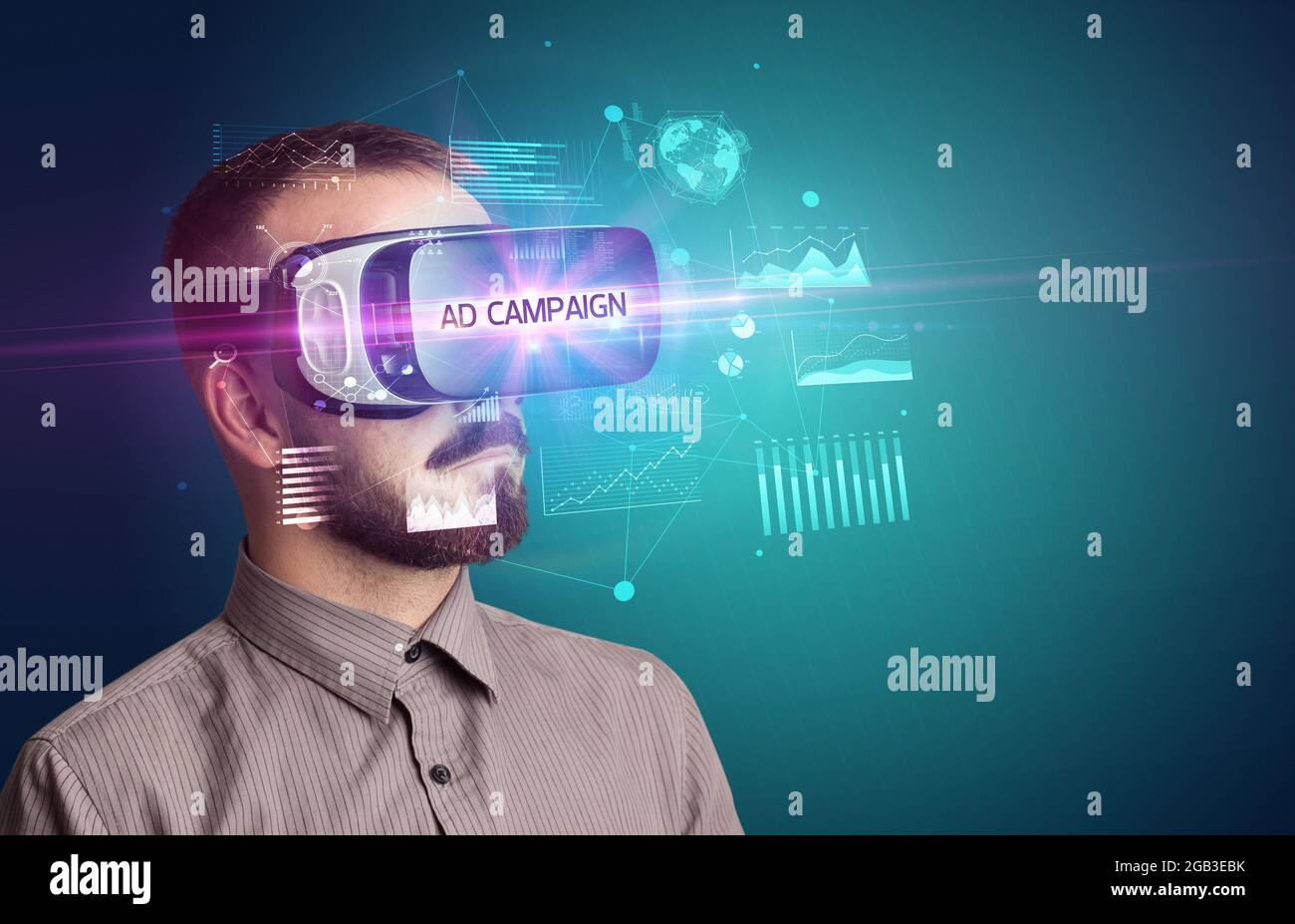 Businessman looking through Virtual Reality glasses Stock Photo - Alamy