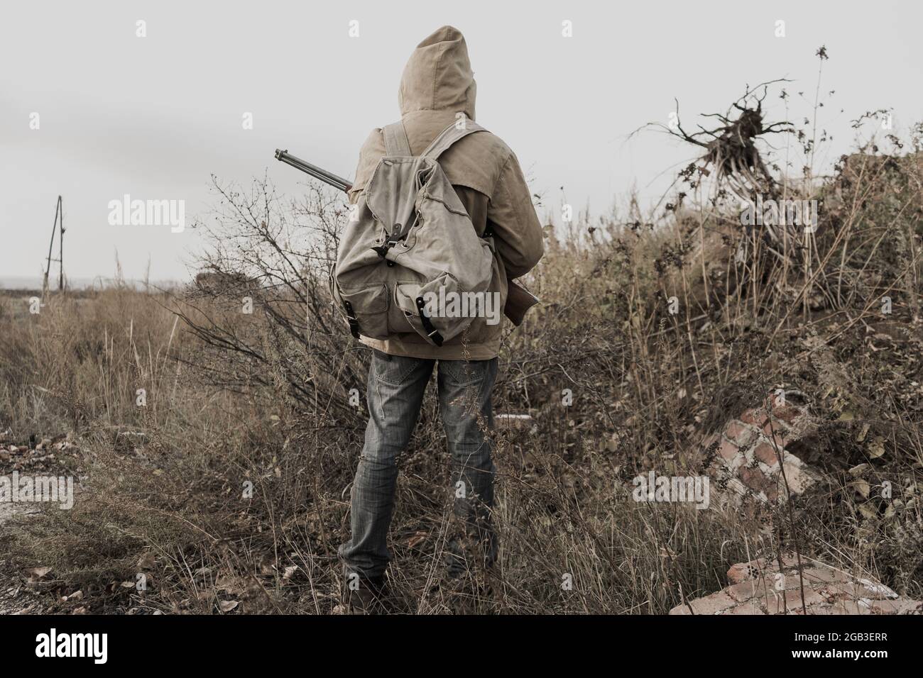 wandering boy. boy with a gun. boy goes to an abandoned building. boy ...