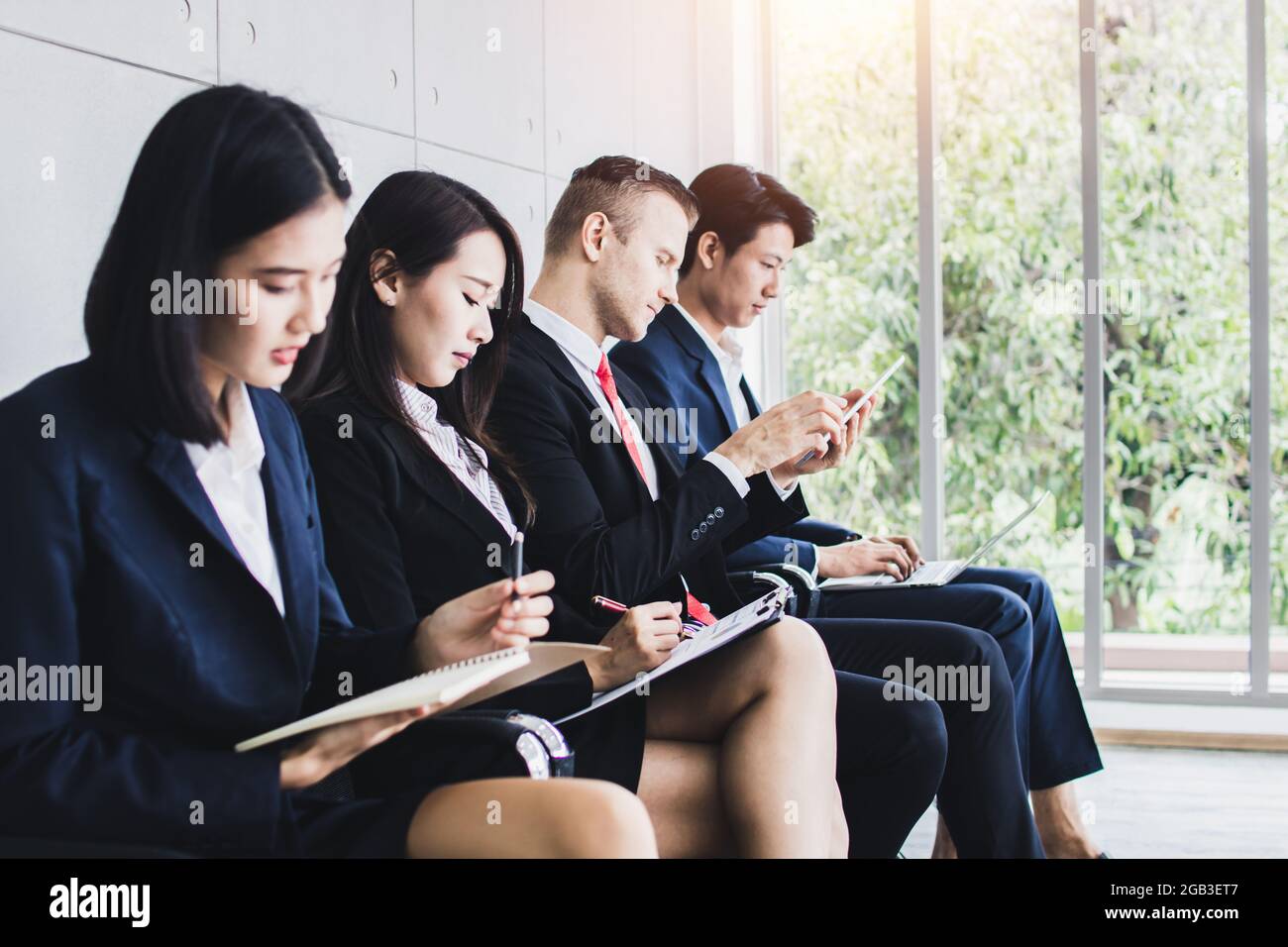 Job candidates queue hi-res stock photography and images - Alamy