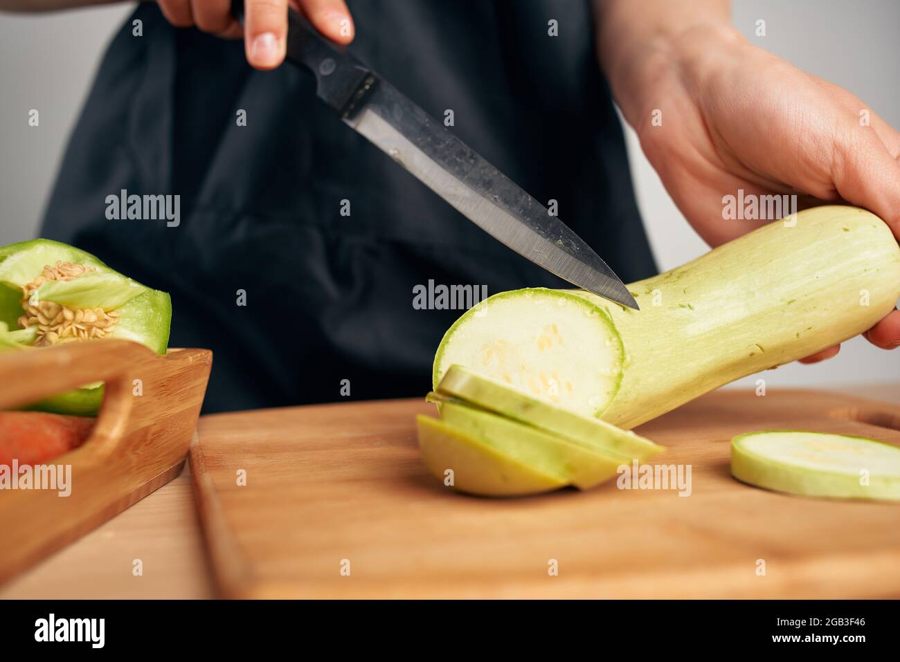 cutting vegetables in the kitchen cooking healthy eating close-up Stock ...