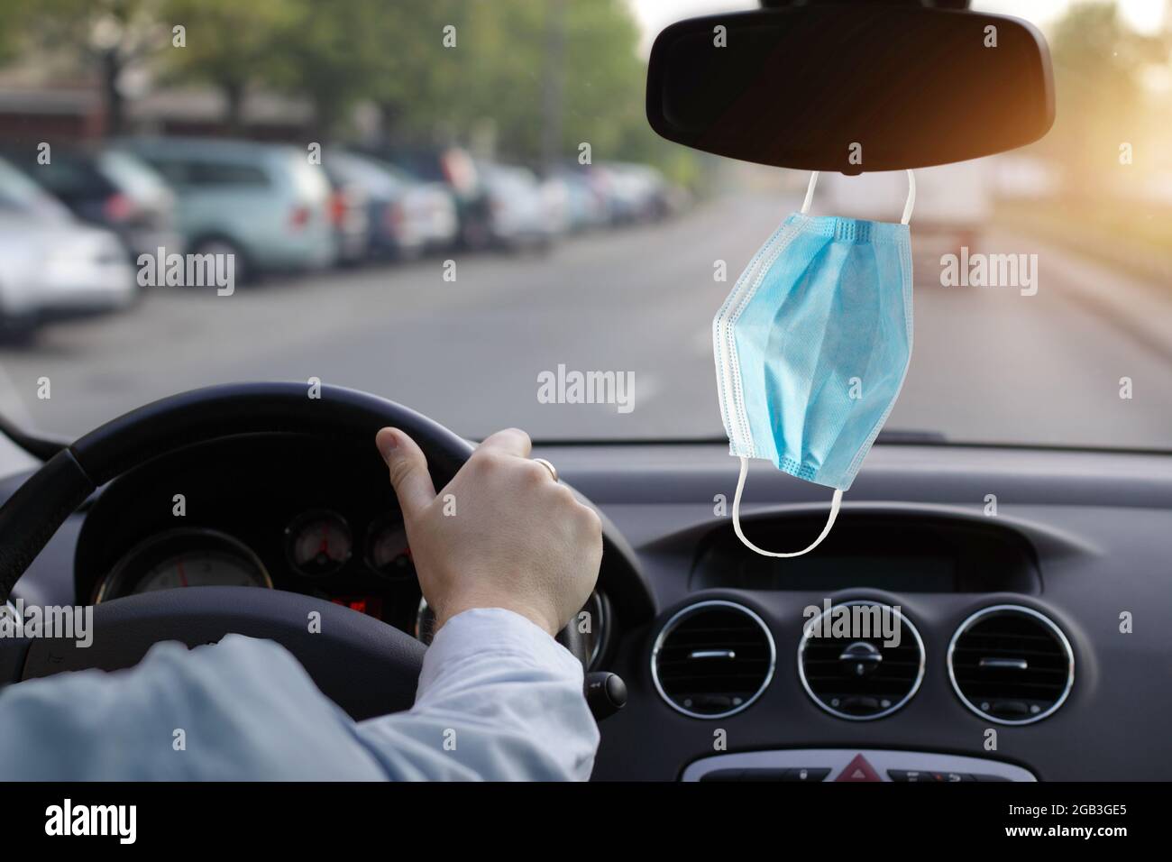 Car with mask hi-res stock photography and images - Alamy
